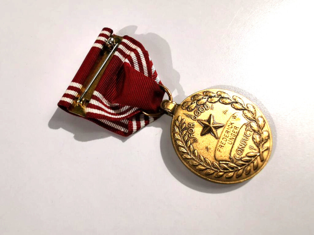 U.S. Army good conduct medal with 5 knoth device, 35,00