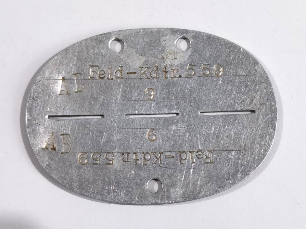 Erkennungsmarke Wehrmacht aus Aluminium eines Angehörigen " Feld-Kdtr