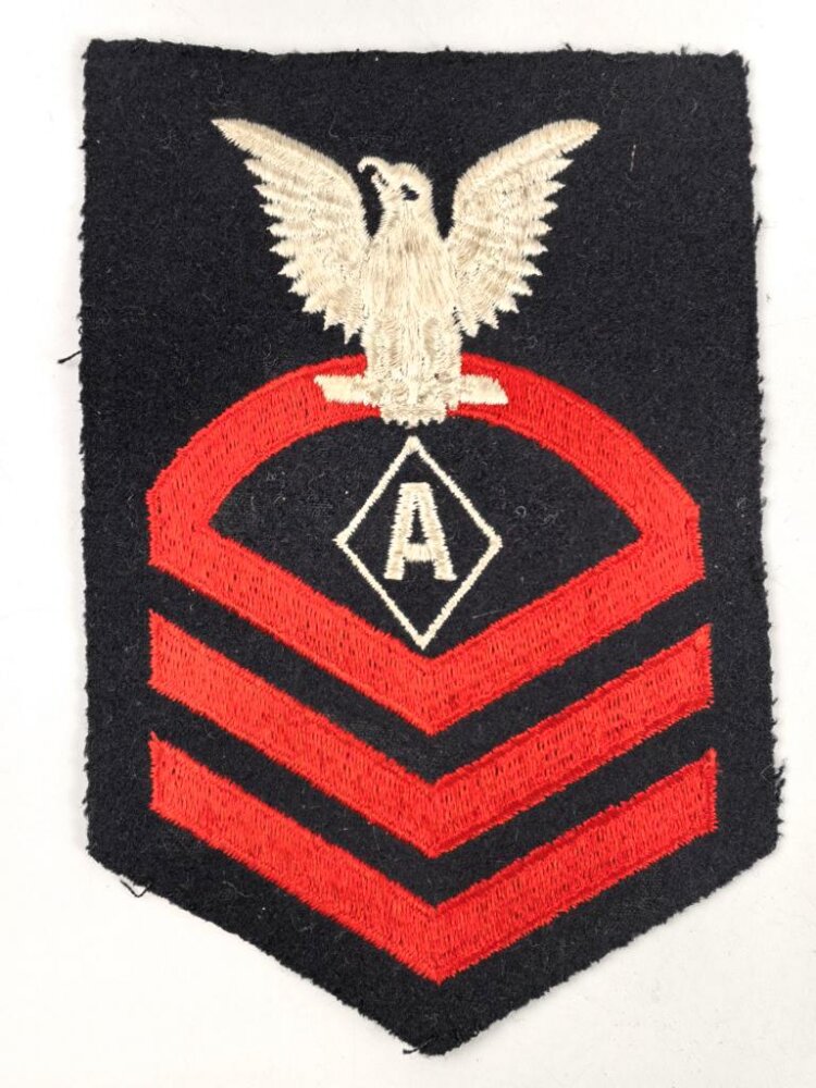 U.S. Navy rating arm badge " A" on dark blue backing, 15,00