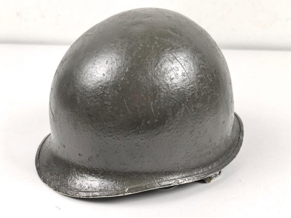 U.S. Army WWII, front seam M1 steel helmet shell. Original paint, reu