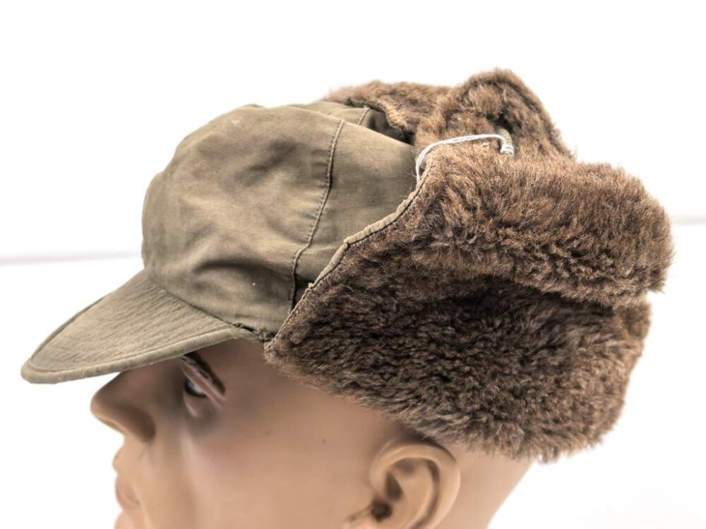 U.S. Army , M51 pile cap, well used, size 56. Uncleaned, 25,00